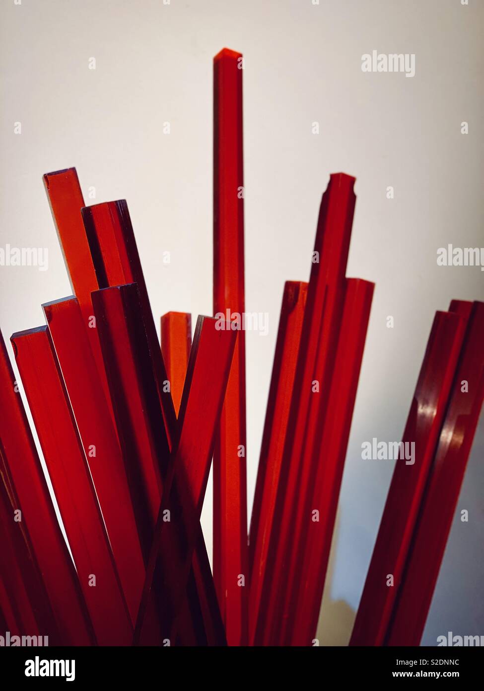 Red Acrylic Squared Rods With White Background Stock Photo - Alamy