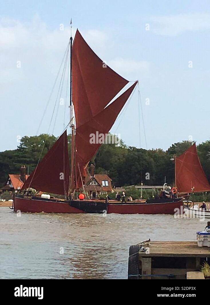 Beautiful red sail barge Stock Photo - Alamy