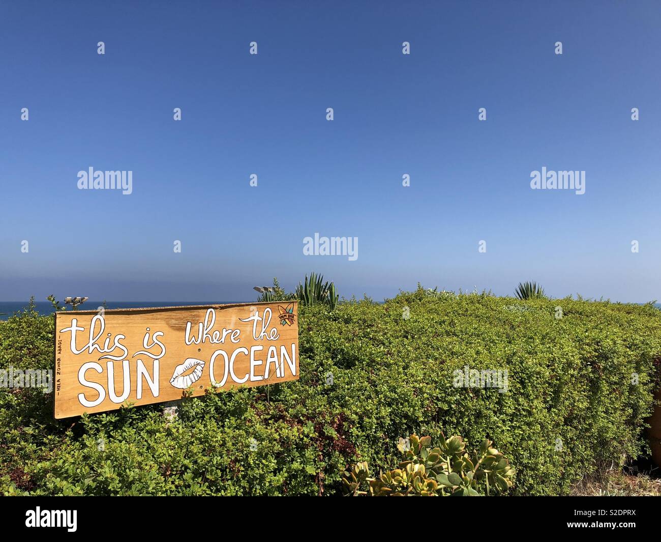 Where the sun meets the ocean Stock Photo - Alamy