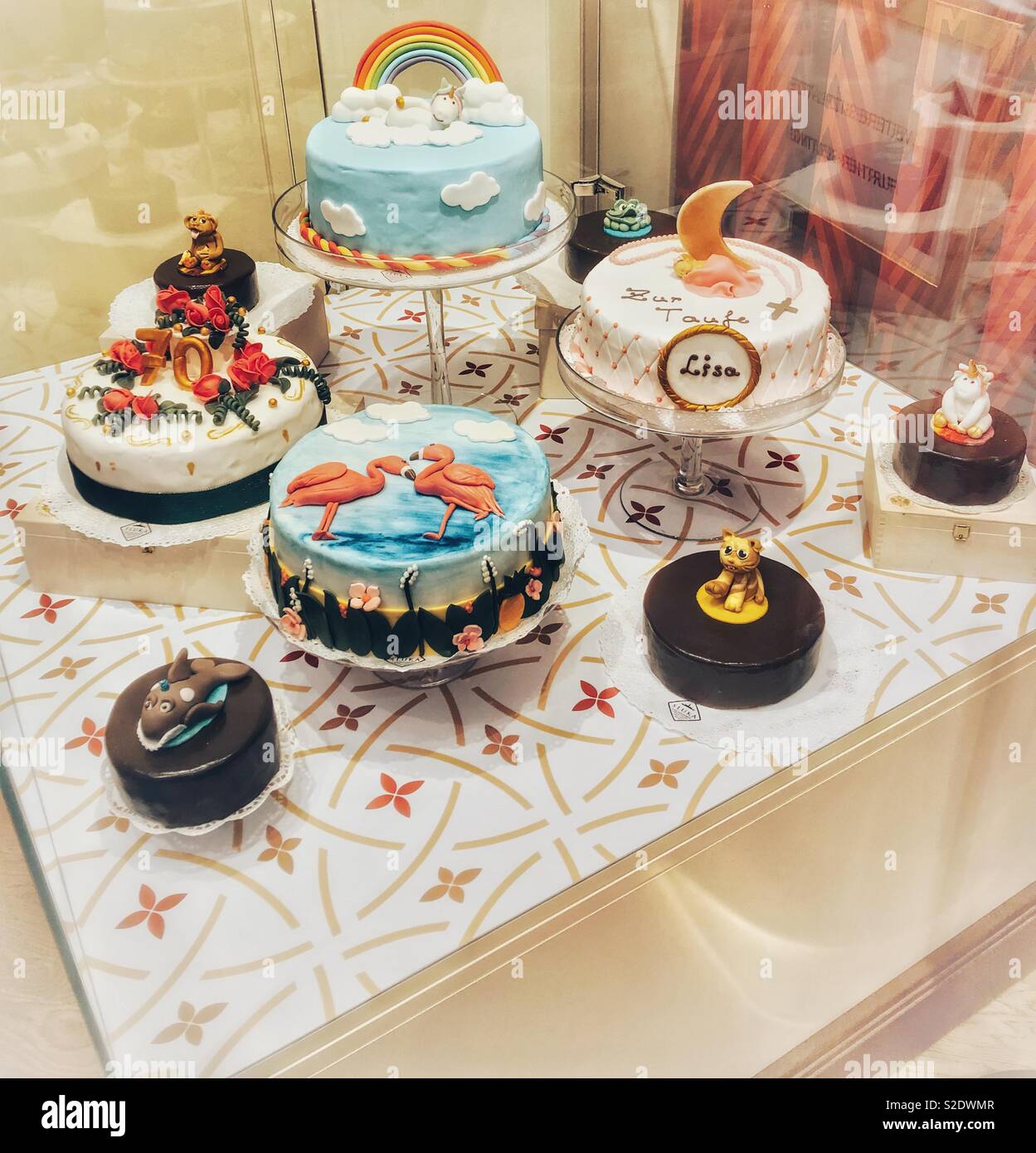A display of decorated cakes Stock Photo - Alamy