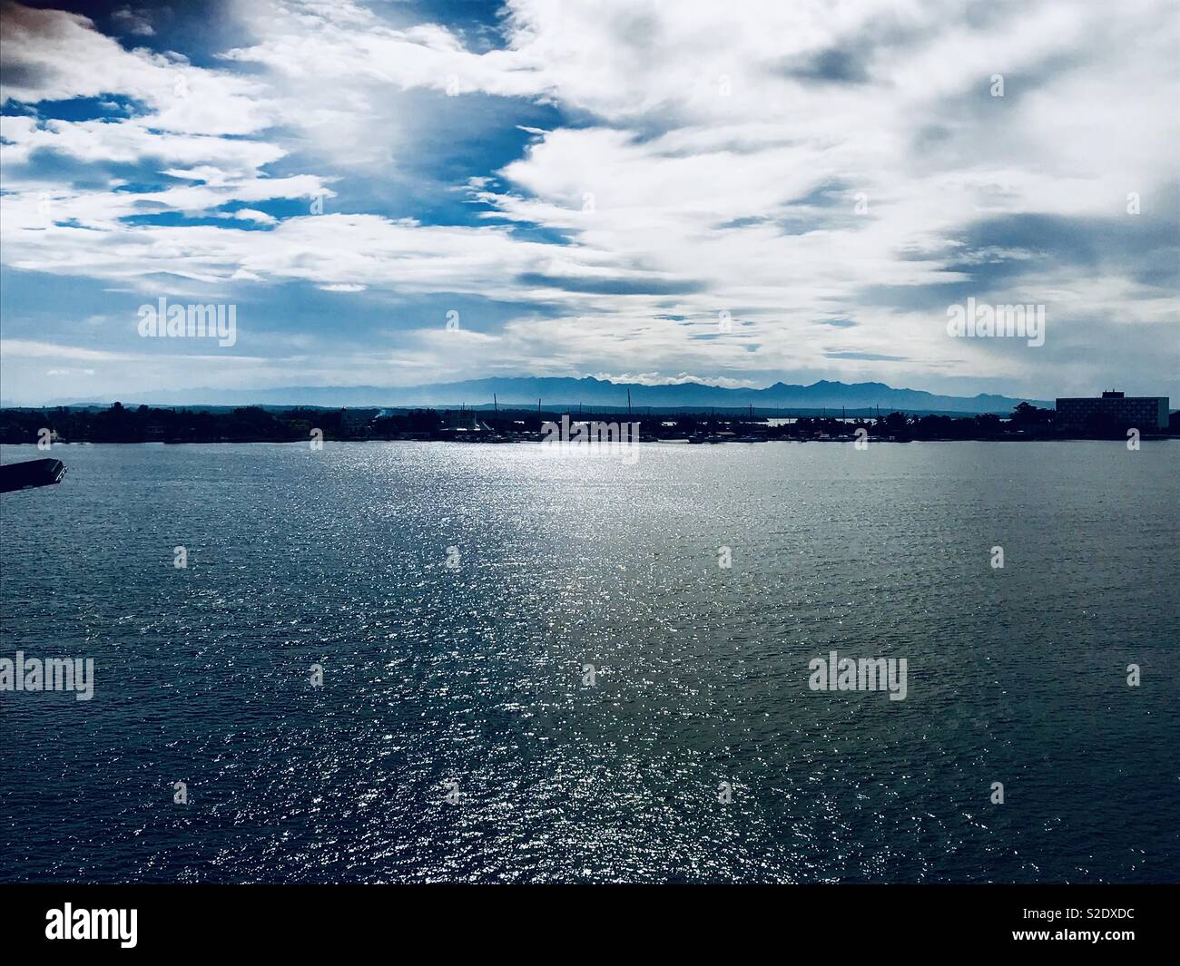 Blue skies water hi-res stock photography and images - Alamy
