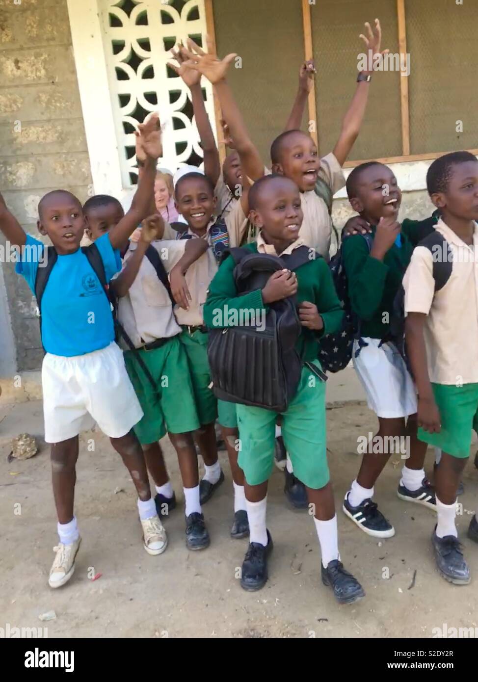 School children posing outside school in Mgongeni a slum area of ...