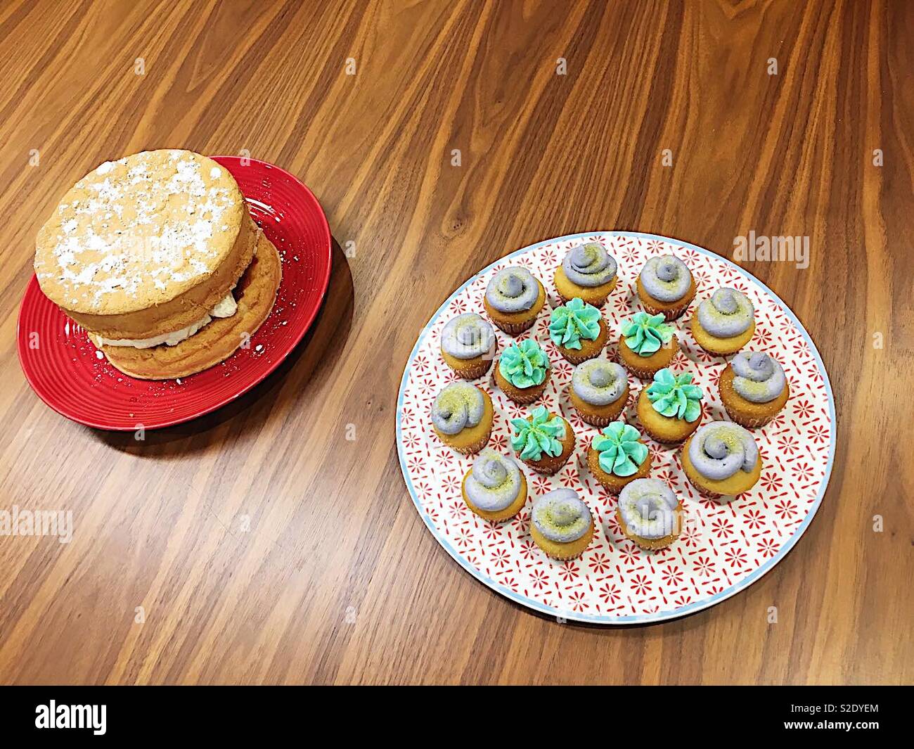 Yummy cake and cupcakes Stock Photo - Alamy