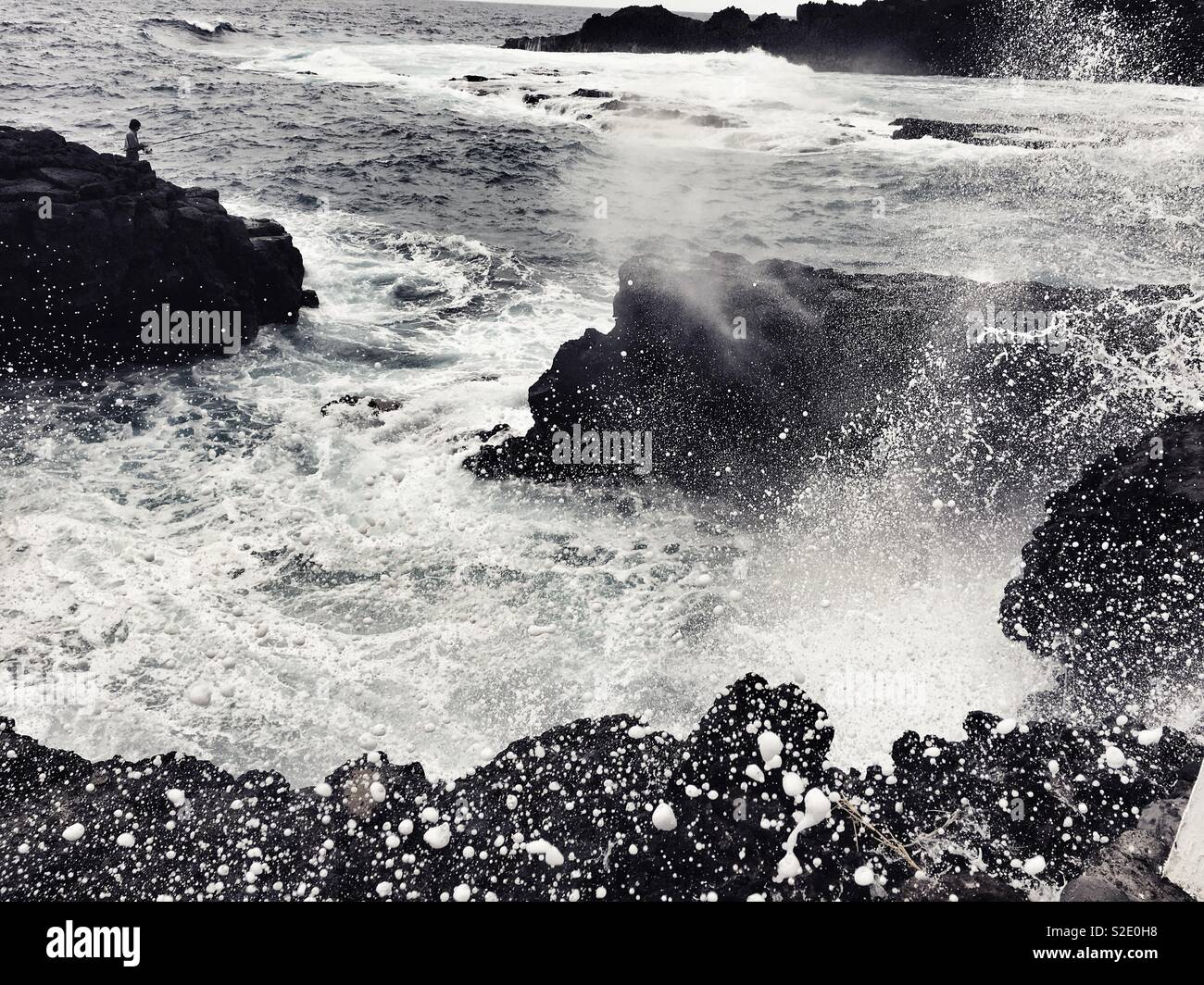 Fishing in a Wild Sea Stock Photo - Alamy