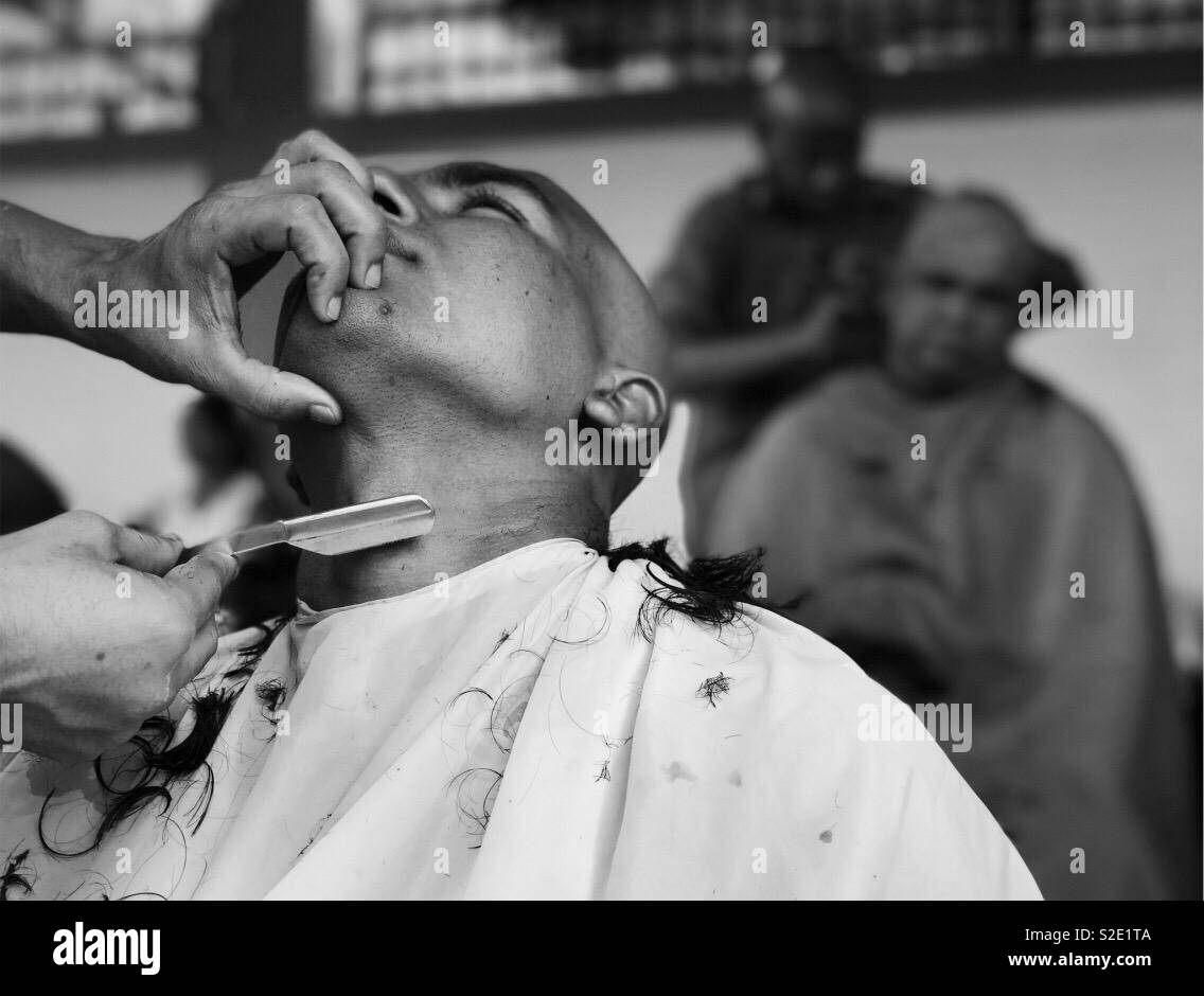 Devotees getting a shave during Thaipusam at Batu Caves Stock Photo - Alamy