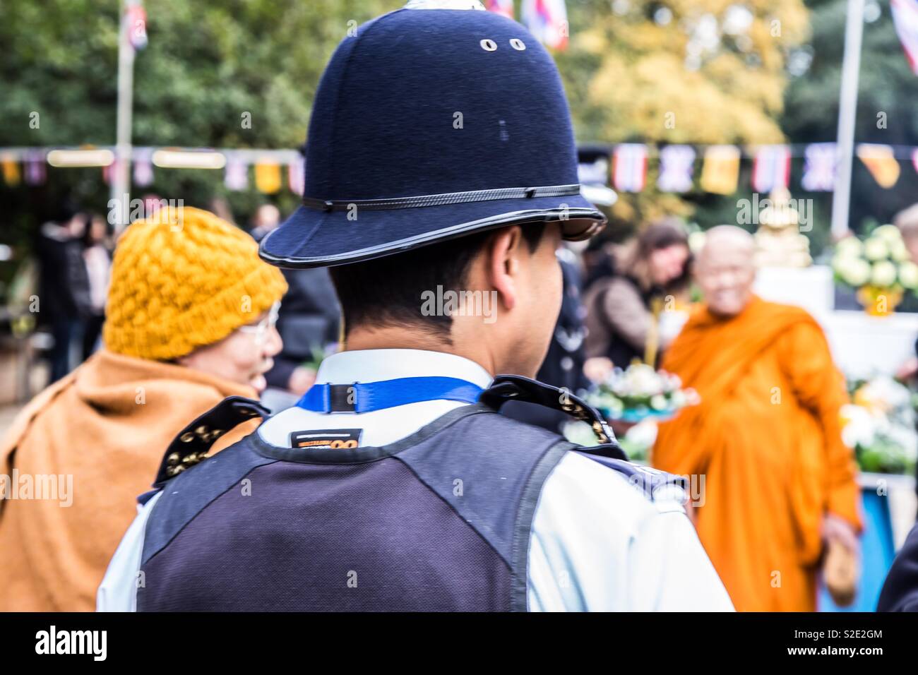 Police officer among monks hi-res stock photography and images - Alamy