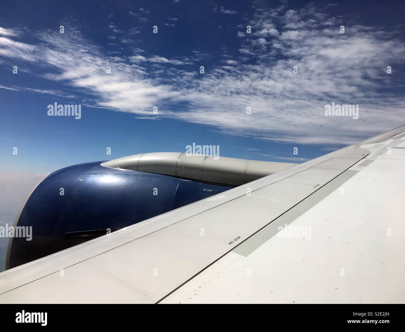 View out of plane window during a daytime flight, Boeing Stock Photo ...