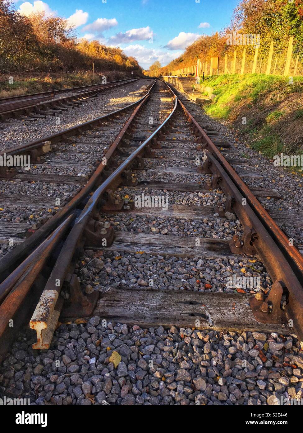 Perspective rail tracks from low level Stock Photo - Alamy
