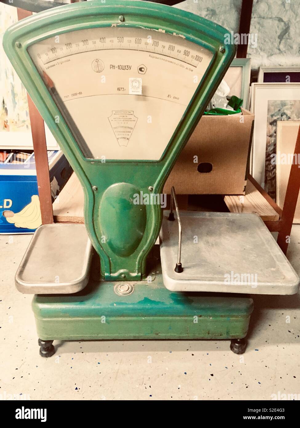 Vintage weight machine Stock Photo - Alamy