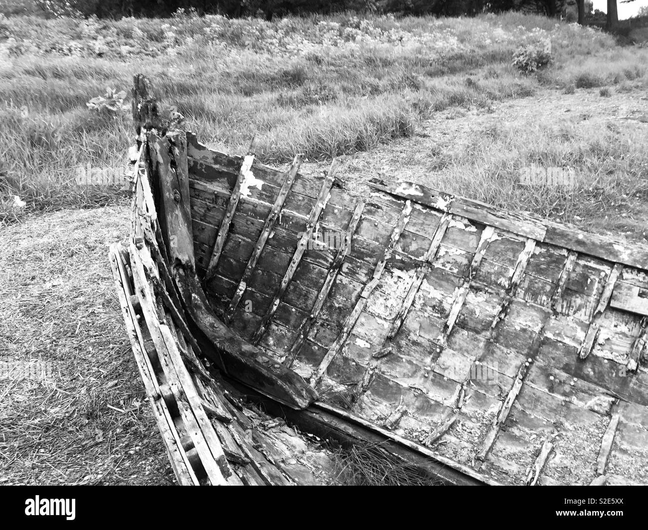 Boat along the coastal path in Norfolk Stock Photo - Alamy