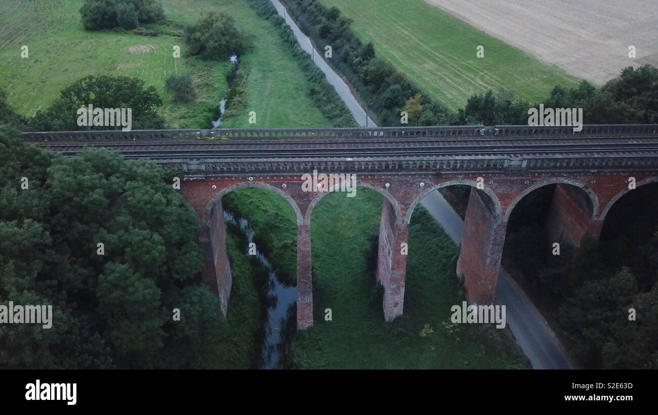 Train bridge in landscape Stock Photo - Alamy