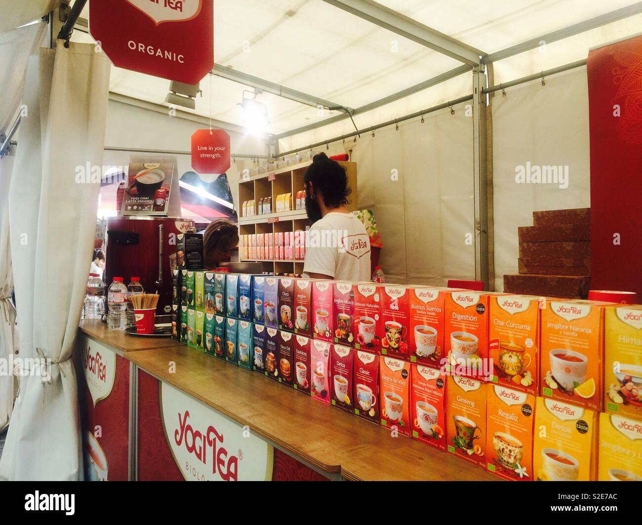Food stall selling boxes of tea on display on counter at market in ...