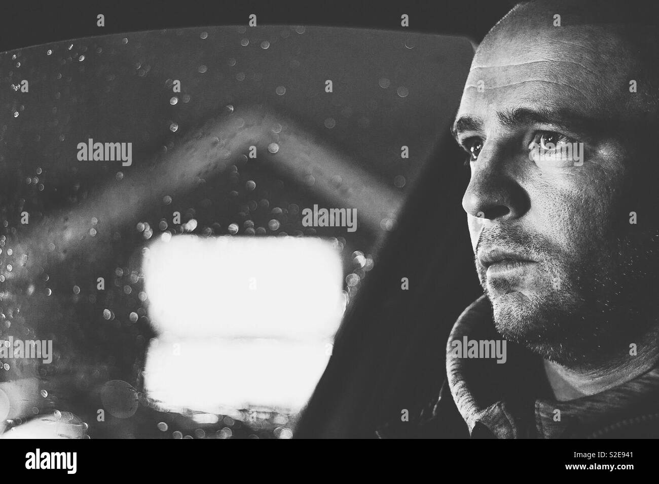 Man car night rain hi-res stock photography and images - Alamy