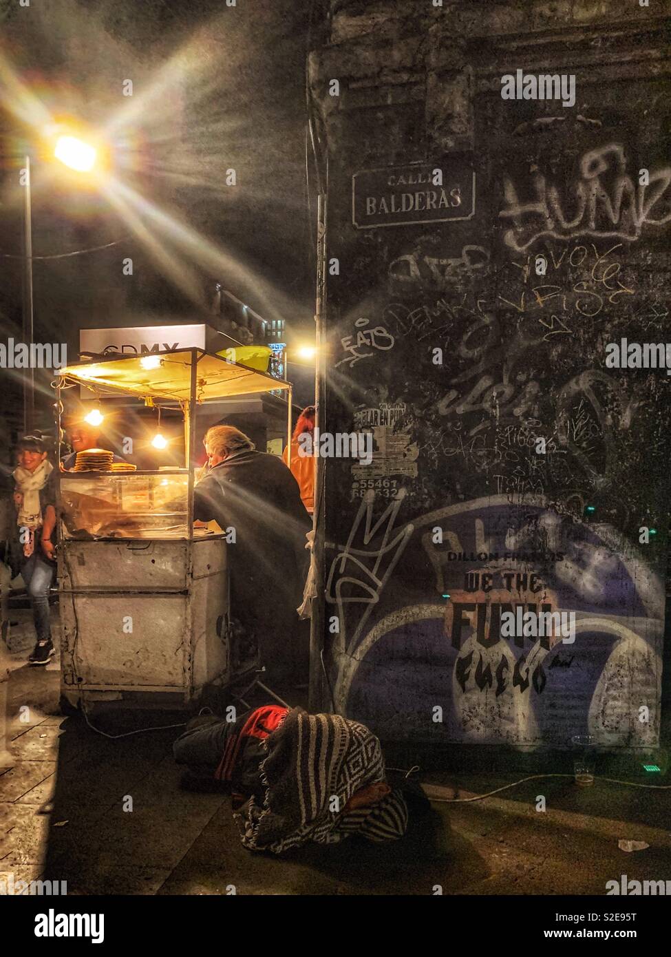 Homeless aman Sleeps Along Side a Street Food Vendor in Mexico City ...