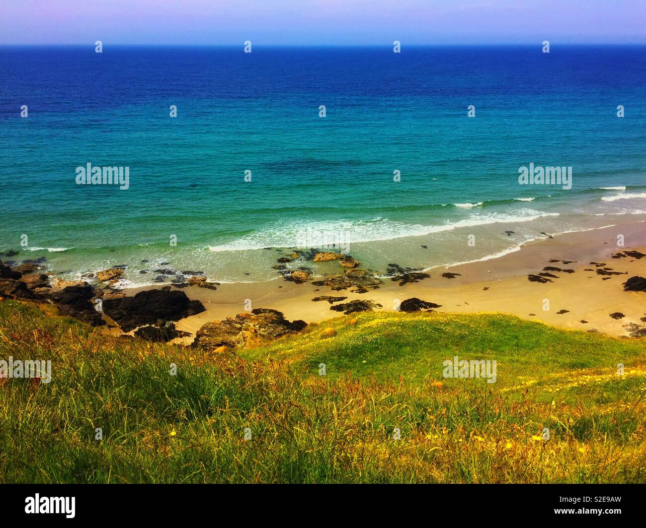 Glorious summers day at Porth Colmon beach in the middle of long summer ...