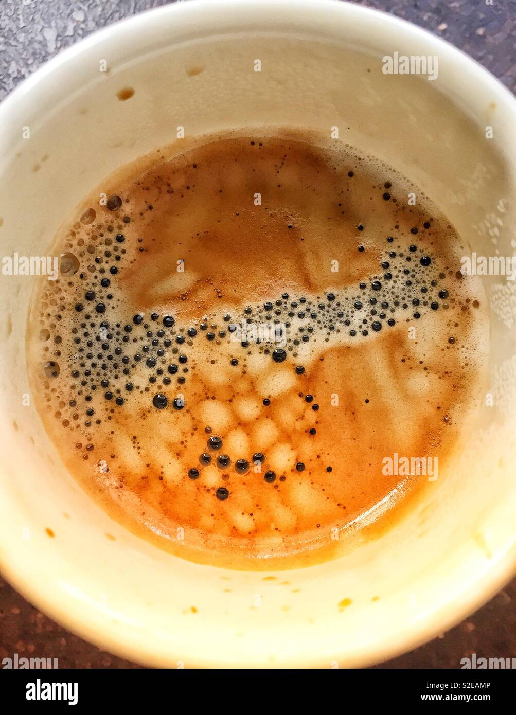 Fresh brewed coffee foam in the cup top view Stock Photo - Alamy