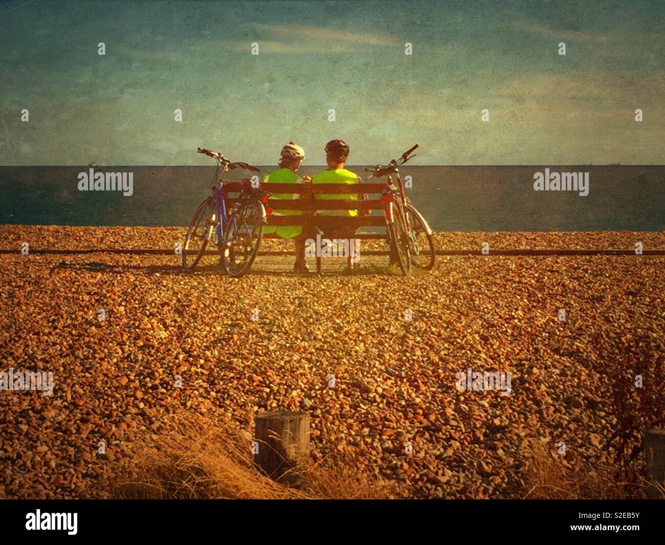 Cyclists resting on bench hi-res stock photography and images - Alamy
