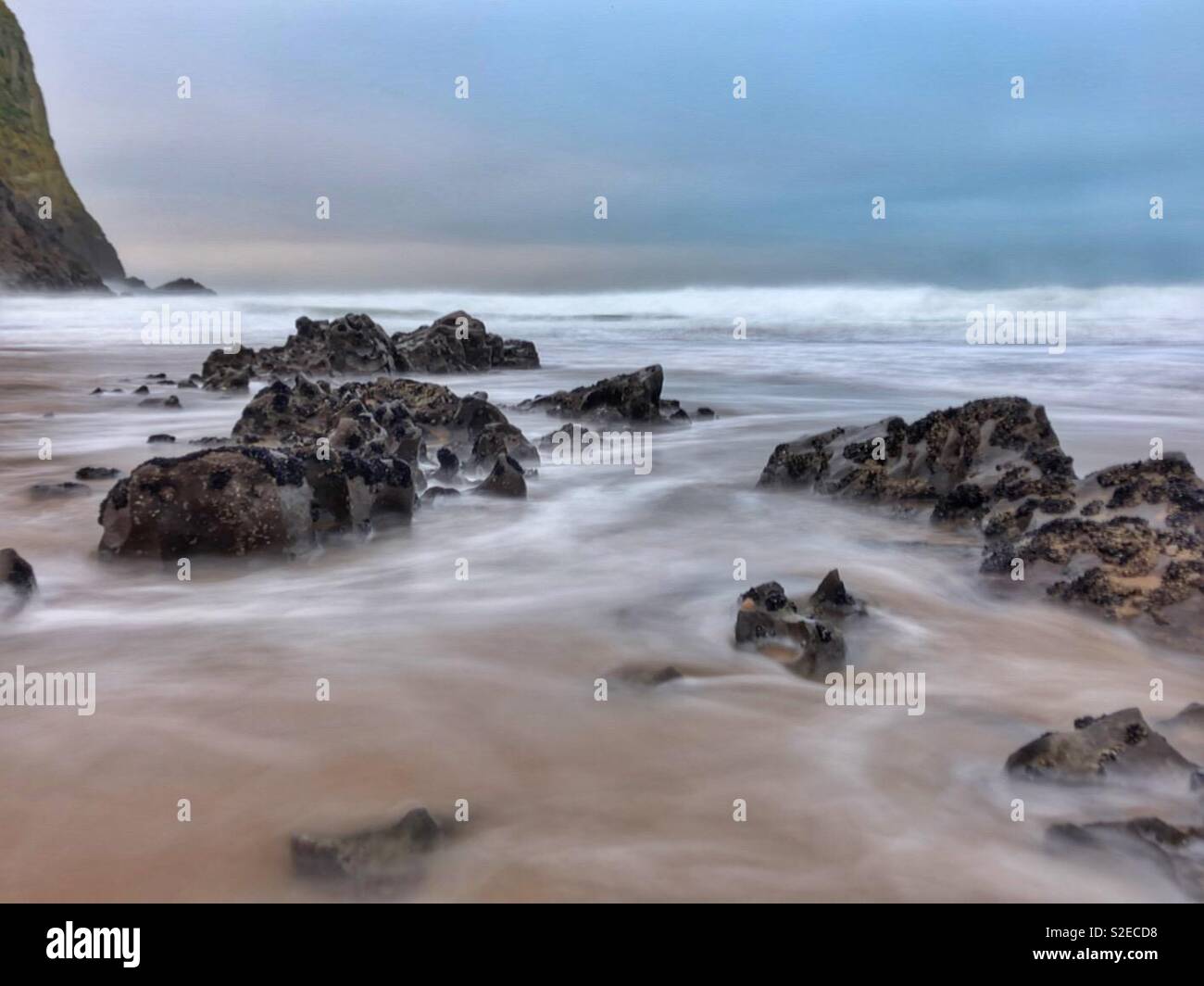 Incoming morning tide at Mewslade beach, Gower, Wales, November Stock ...