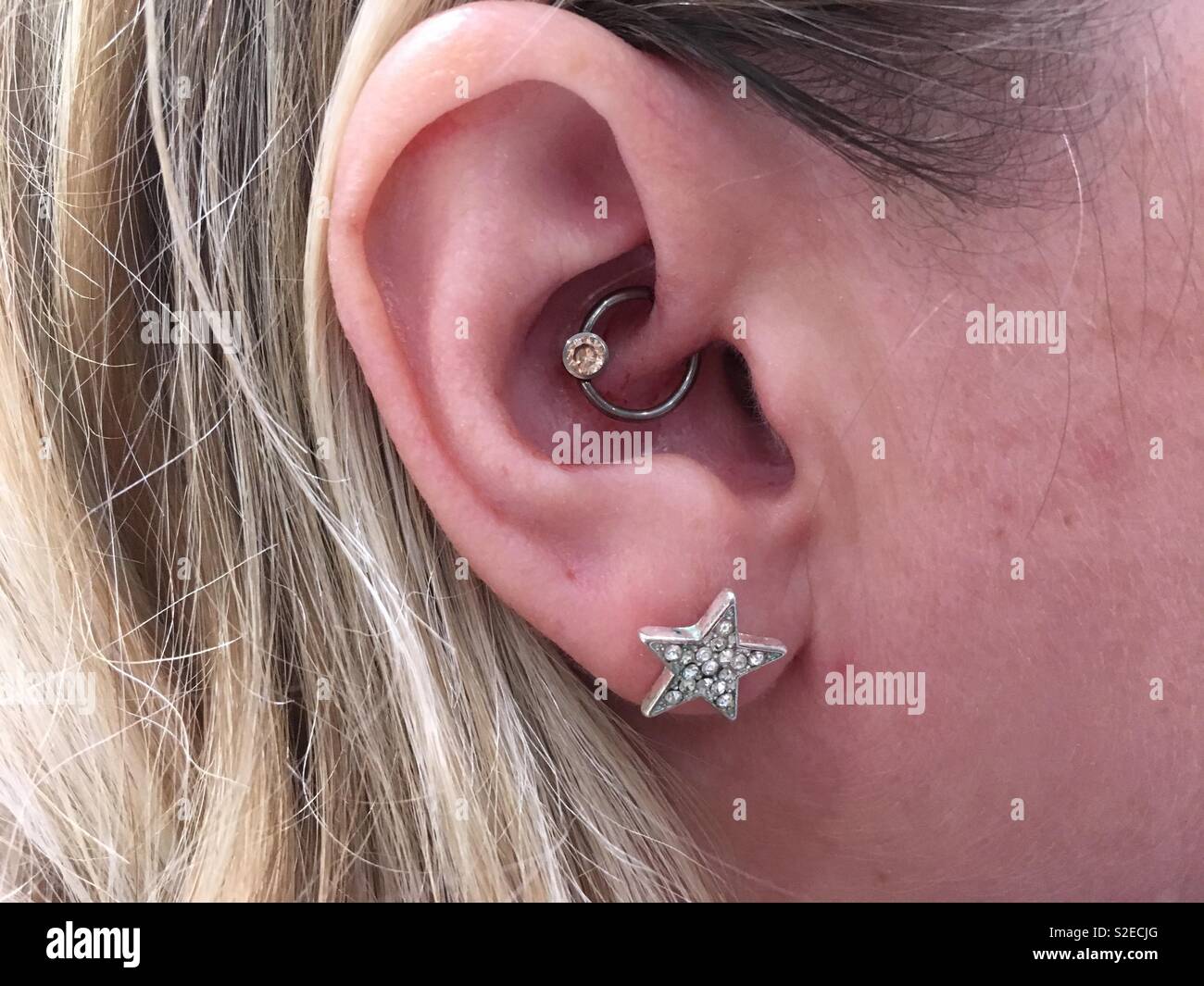 Daith piercing hi-res stock photography and images - Alamy