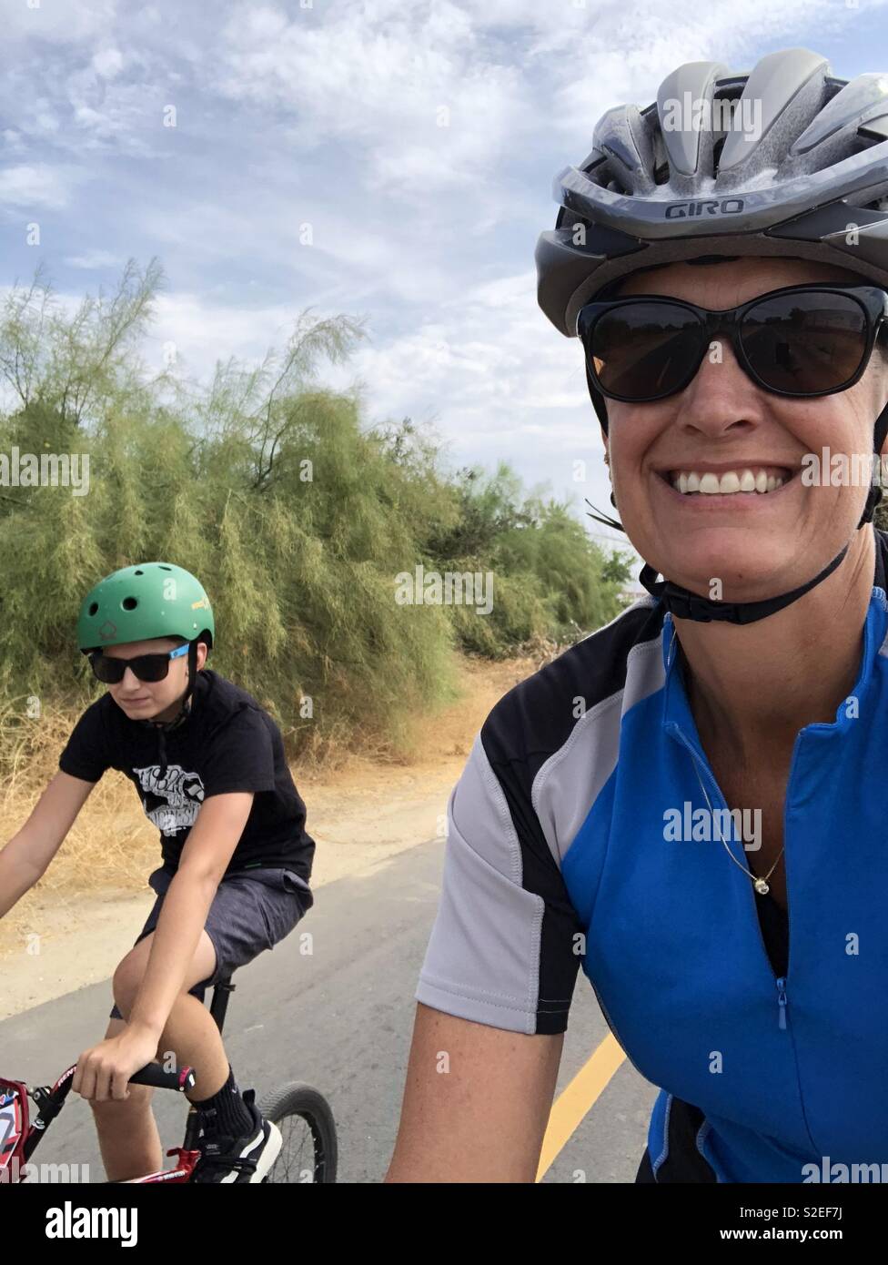 Family time bike ride Stock Photo - Alamy