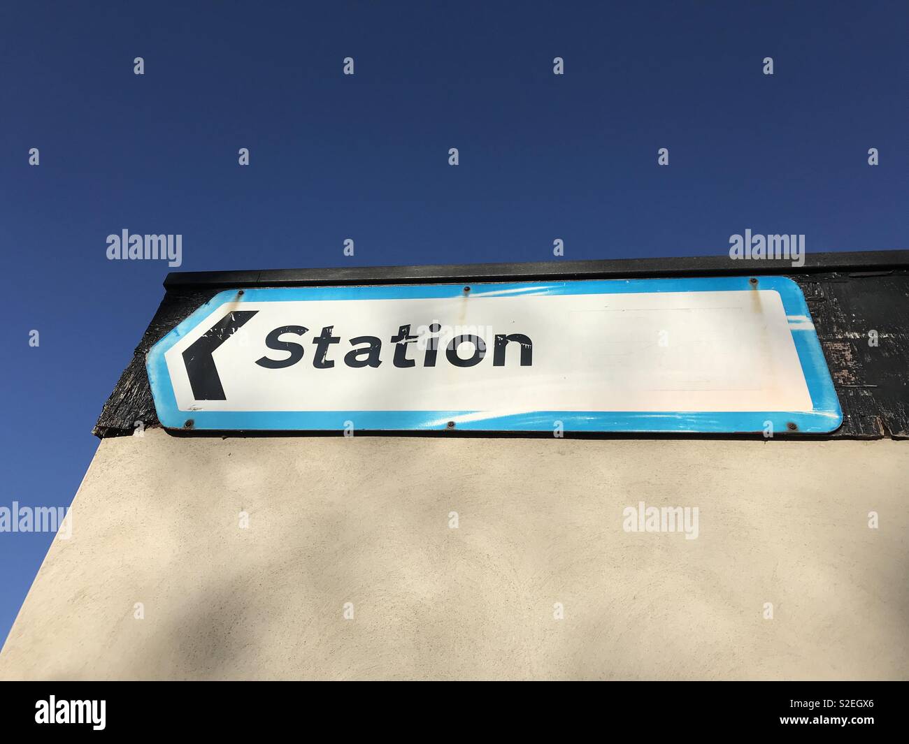Faded station sign (railway Stock Photo - Alamy