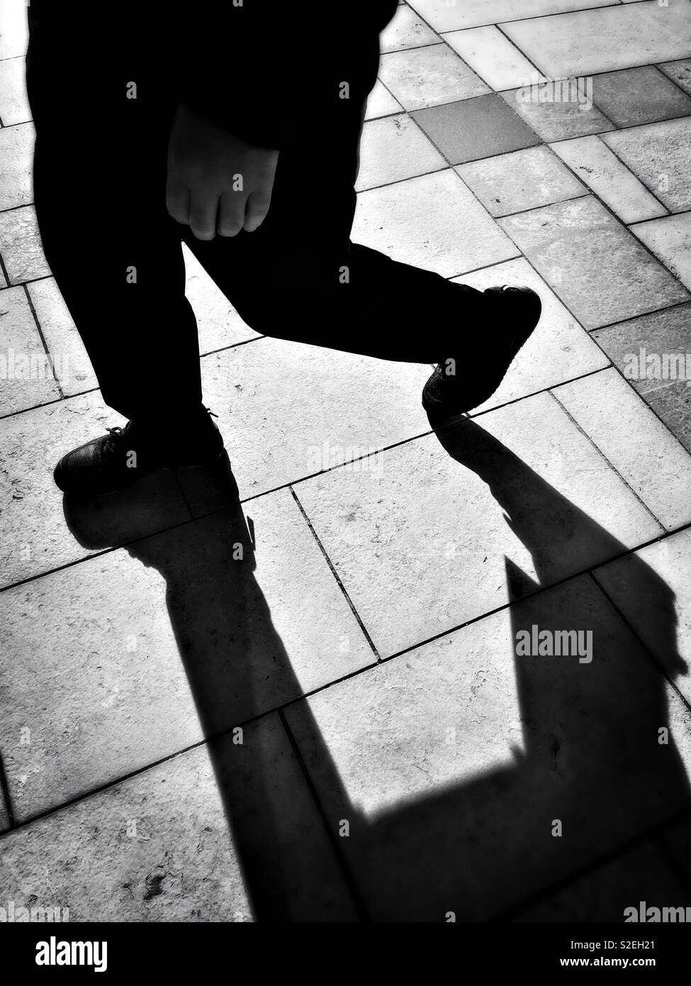 Man casting shadows hi-res stock photography and images - Alamy
