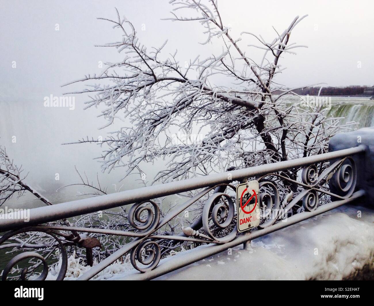 Niagara Falls in winter with iced over fence Stock Photo - Alamy
