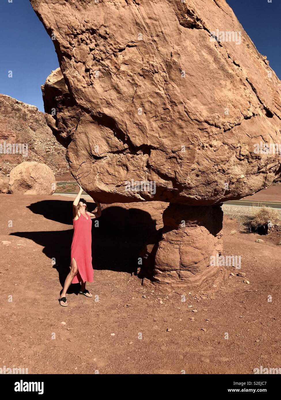 Woman holding rock hi-res stock photography and images - Alamy
