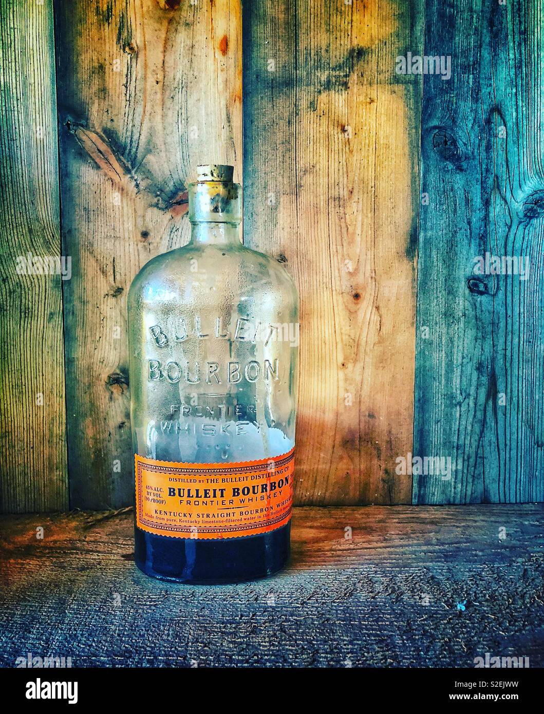 Old bourbon bottle Stock Photo - Alamy