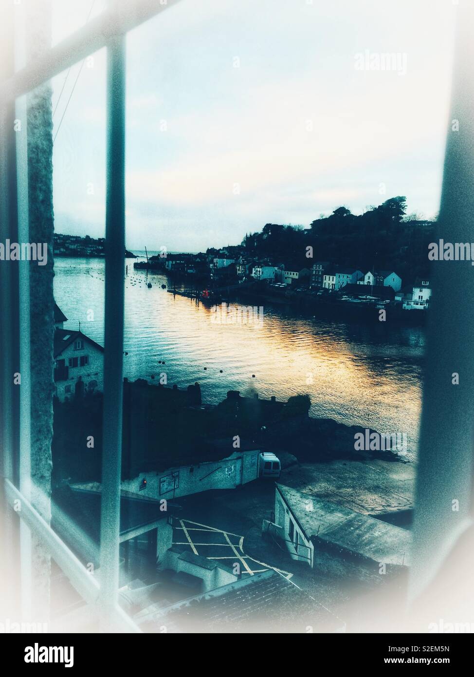Beautiful View out of the window across the water Stock Photo - Alamy