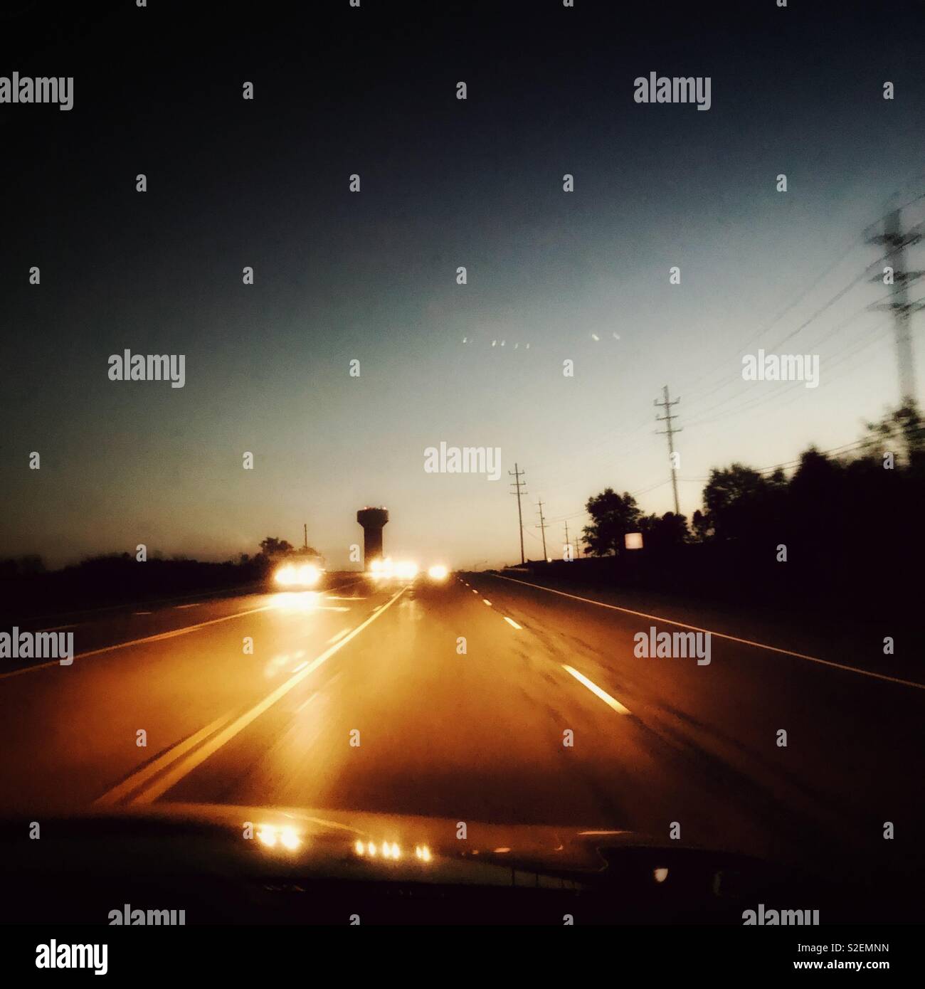 Car headlights at night hi-res stock photography and images - Alamy
