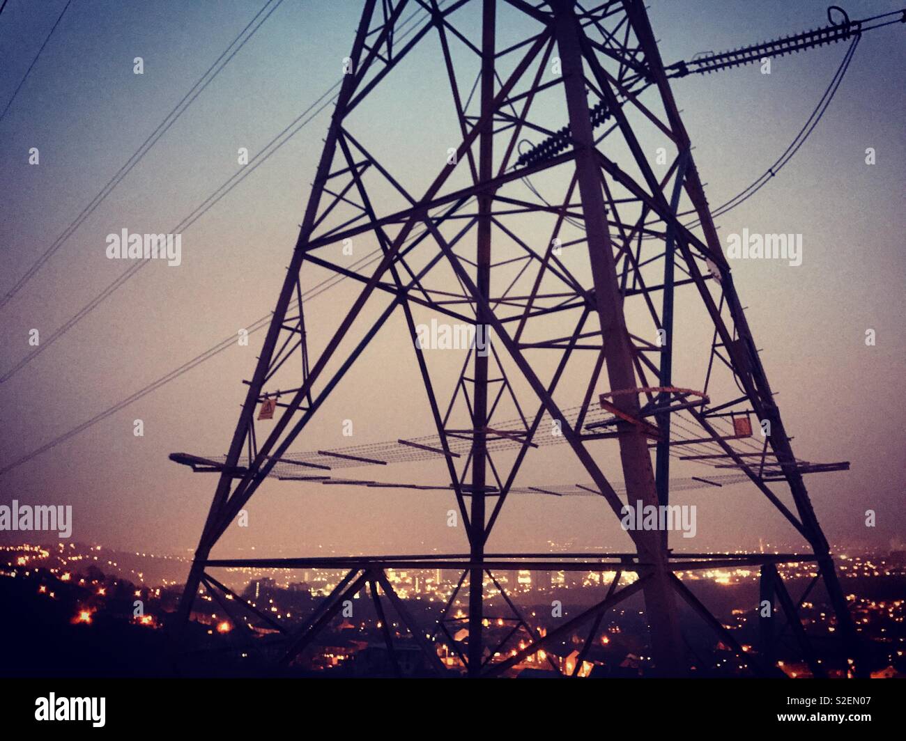 Sunset and Pylon Stock Photo - Alamy