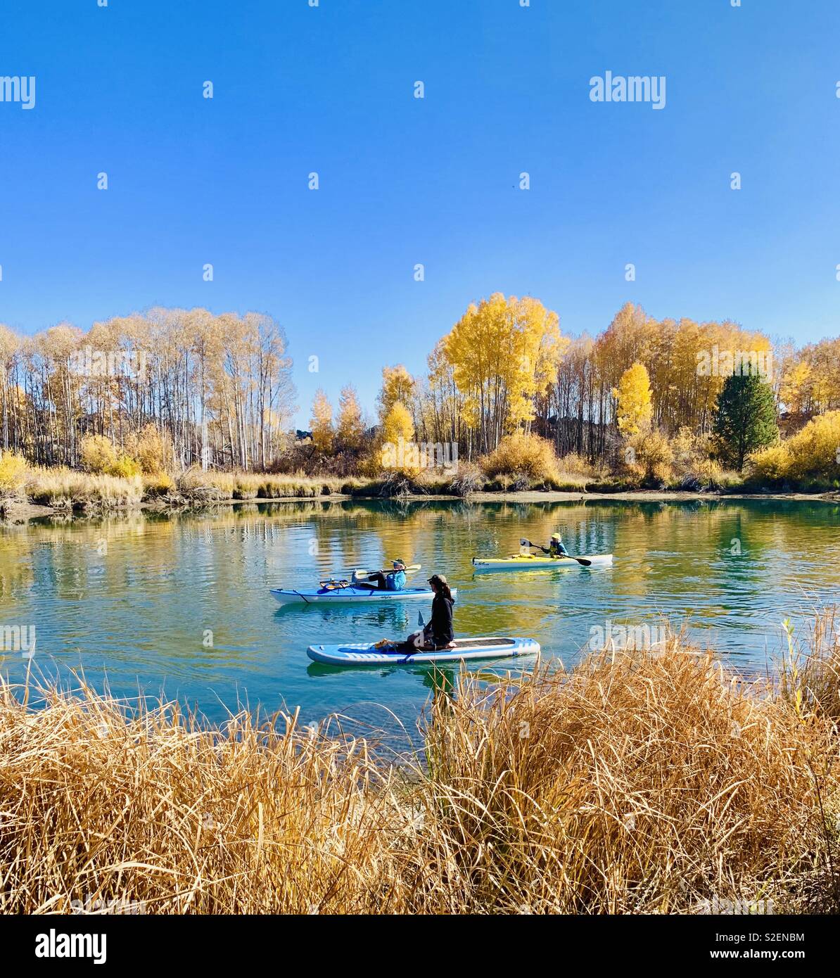 Kayaking in the fall Stock Photo - Alamy