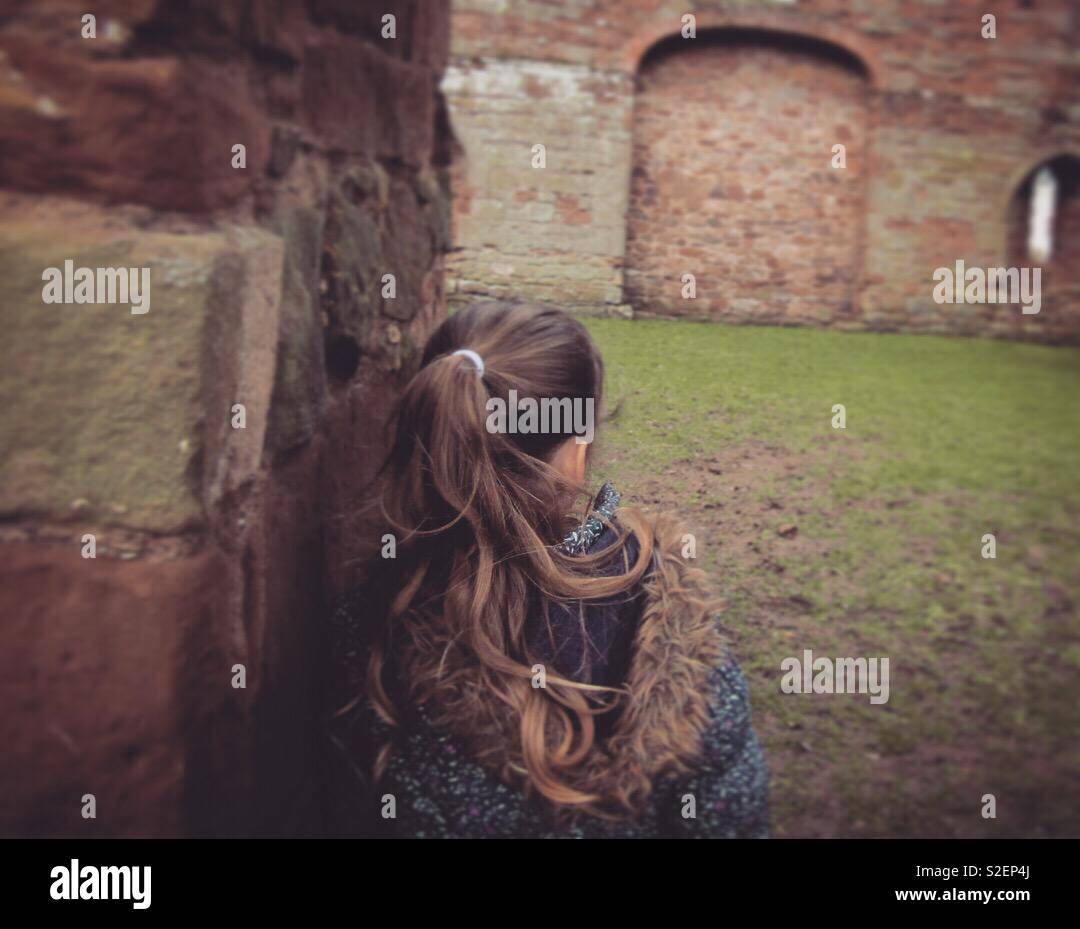 Child amongst abbey ruins Stock Photo - Alamy
