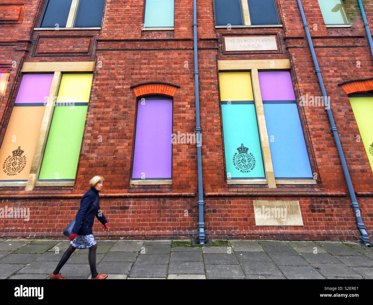 Woman walking past Worcester porcelain museum Stock Photo - Alamy
