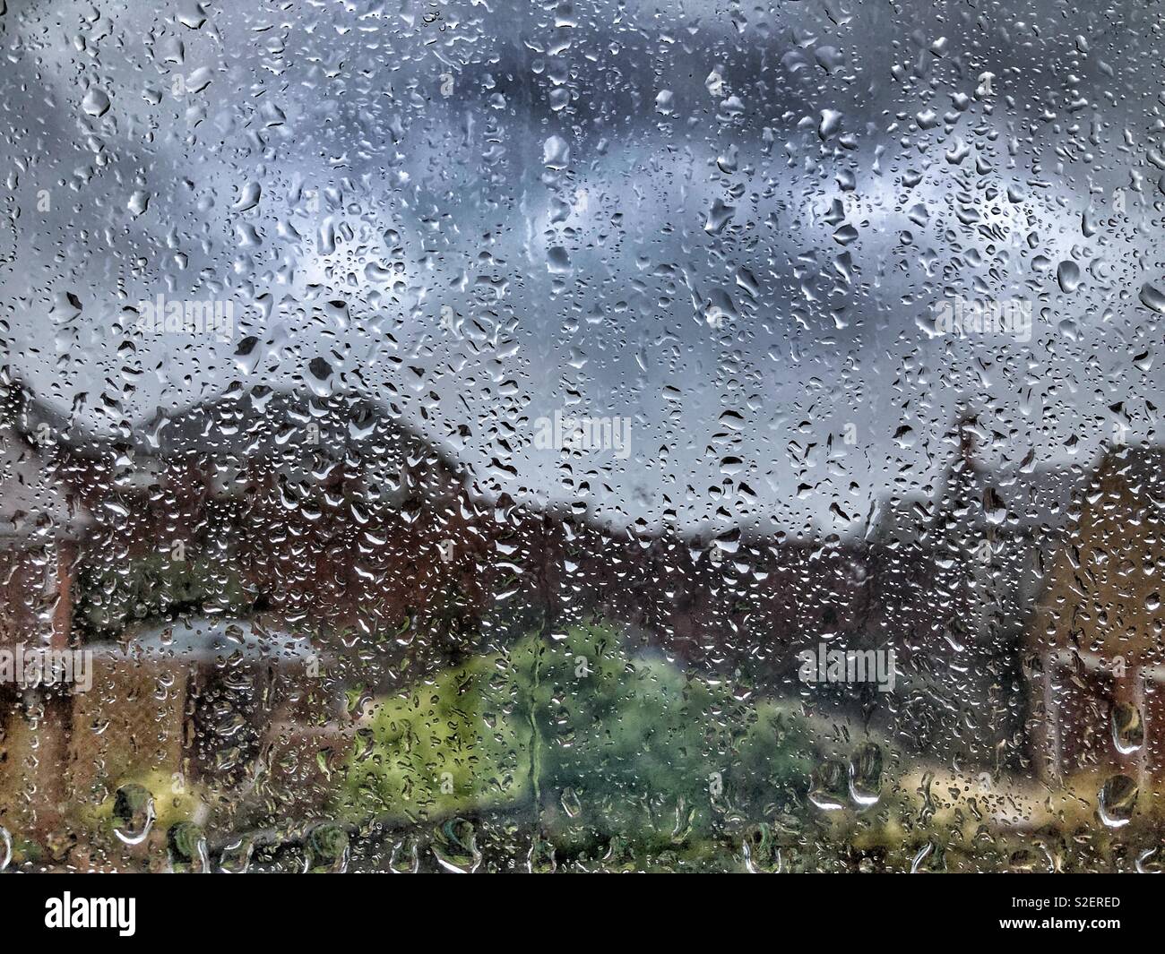 Rain on window Stock Photo - Alamy