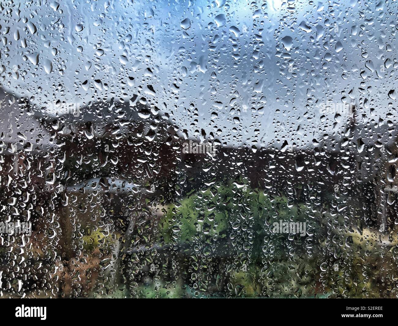 Rain on window Stock Photo - Alamy