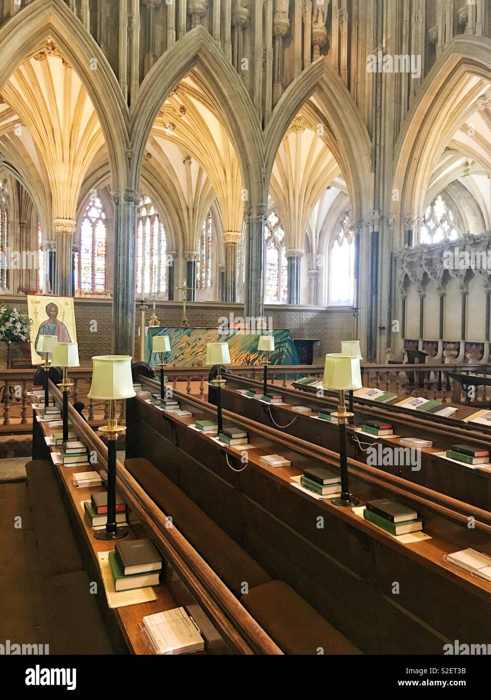 Inside Wells Cathedral, featuring the beautiful arches and pews Stock ...