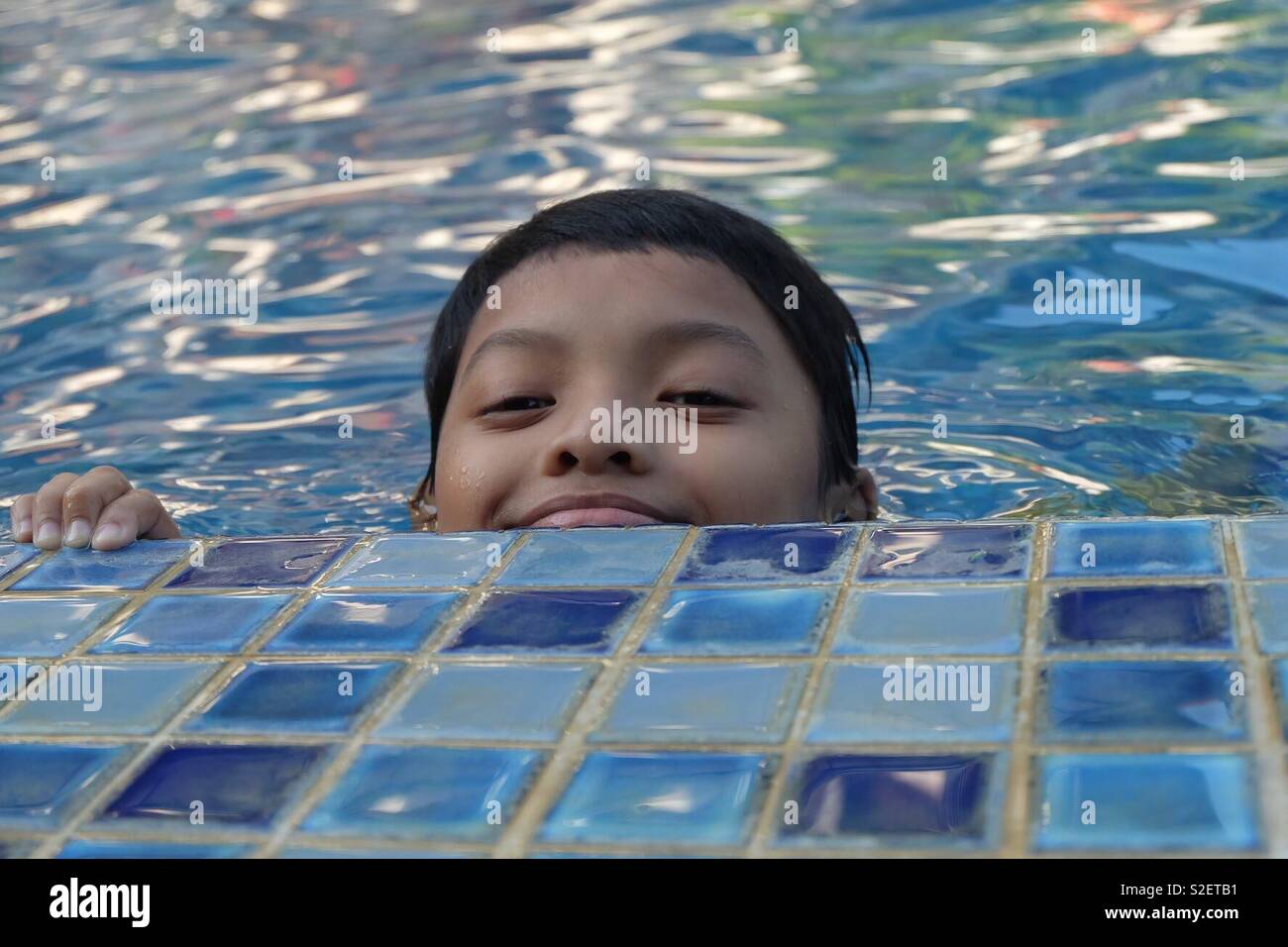 boy enjoy swimming Stock Photo - Alamy