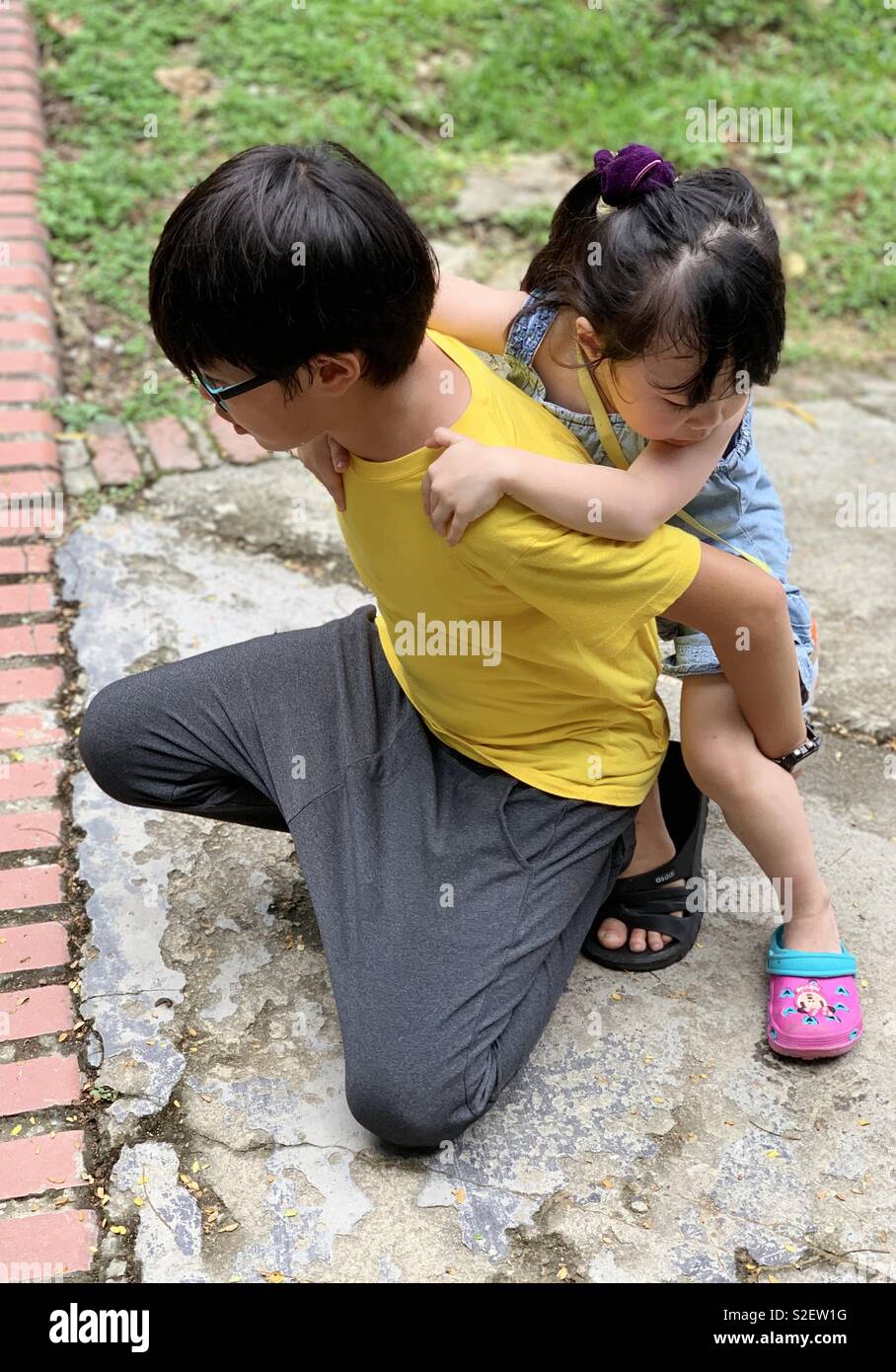 Little brother and sister Stock Photo - Alamy