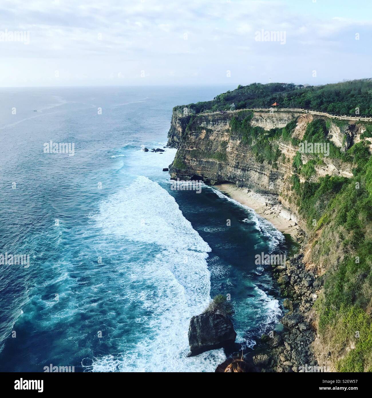 Cliff meets ocean Stock Photo - Alamy