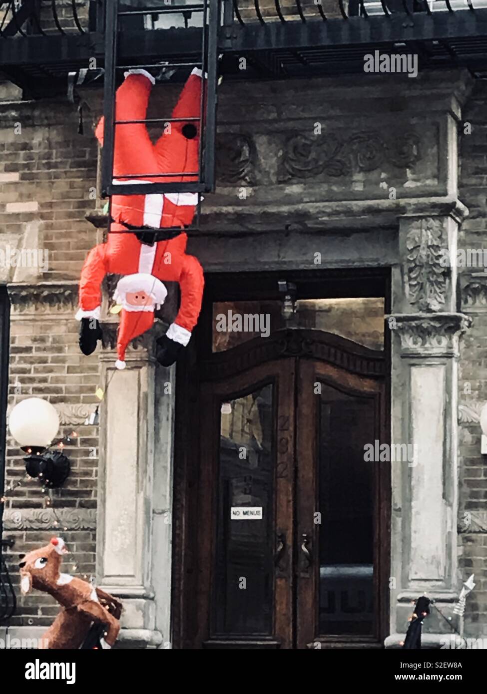 Upside down New York Santa Stock Photo - Alamy