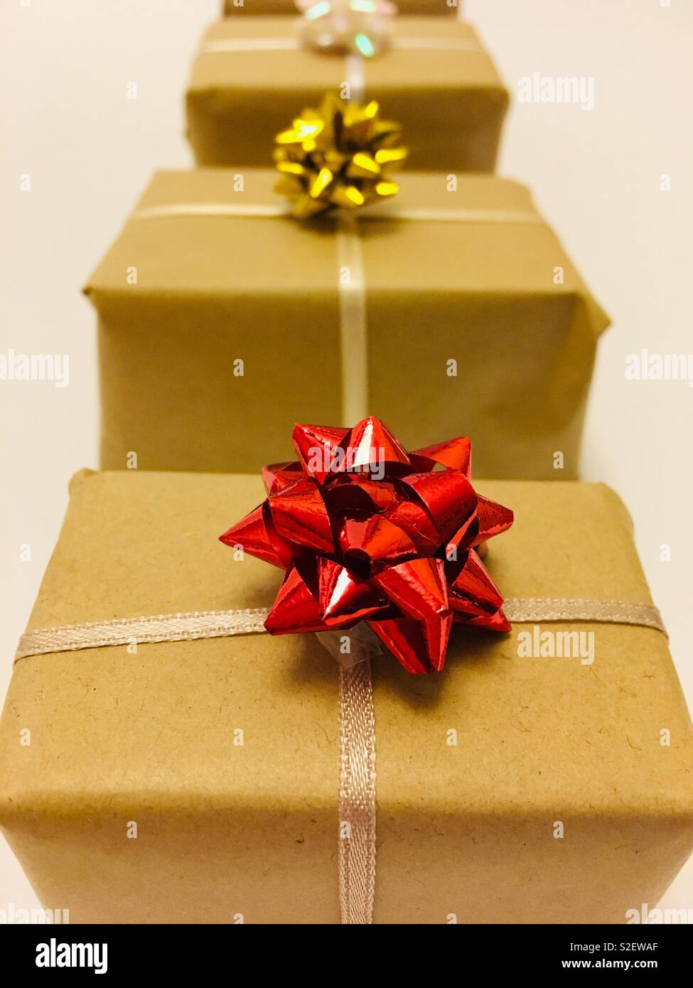 Line of Christmas presents Stock Photo - Alamy