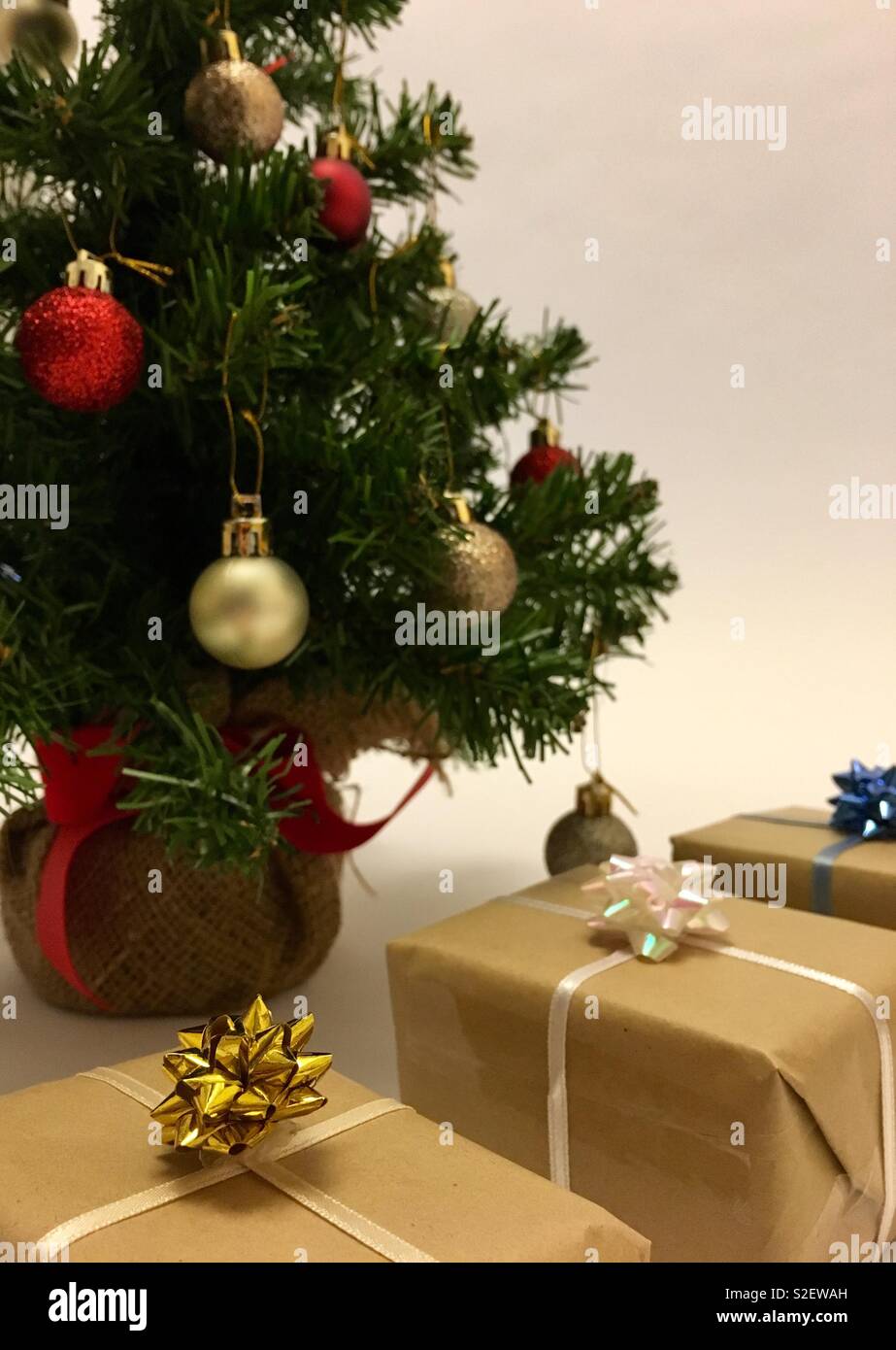 Christmas presents under a Christmas tree Stock Photo - Alamy