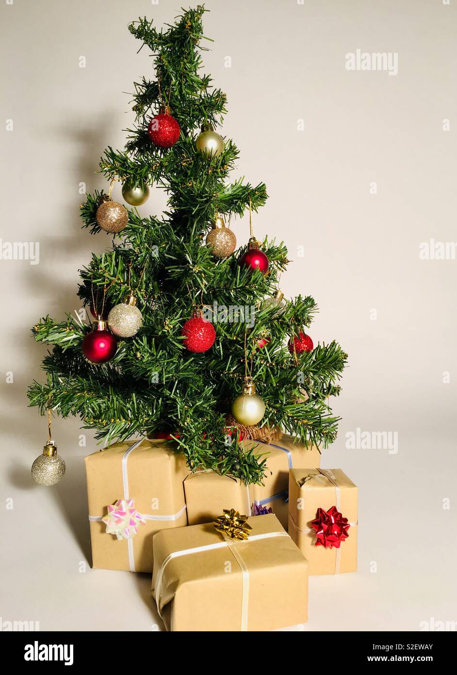 Christmas presents under the Christmas tree Stock Photo - Alamy
