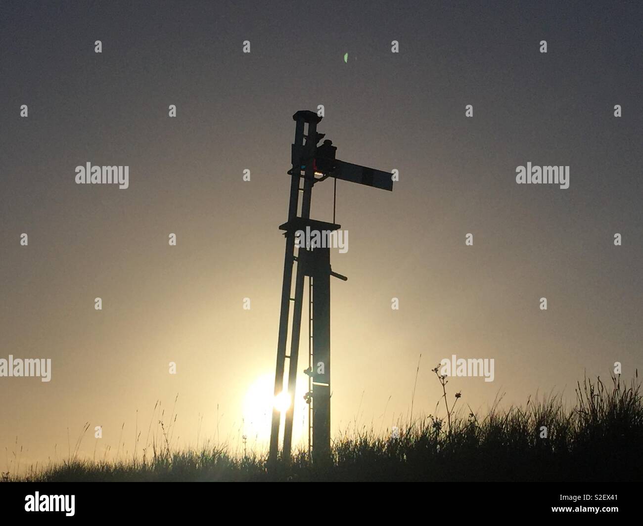 Trains at signal hi-res stock photography and images - Alamy