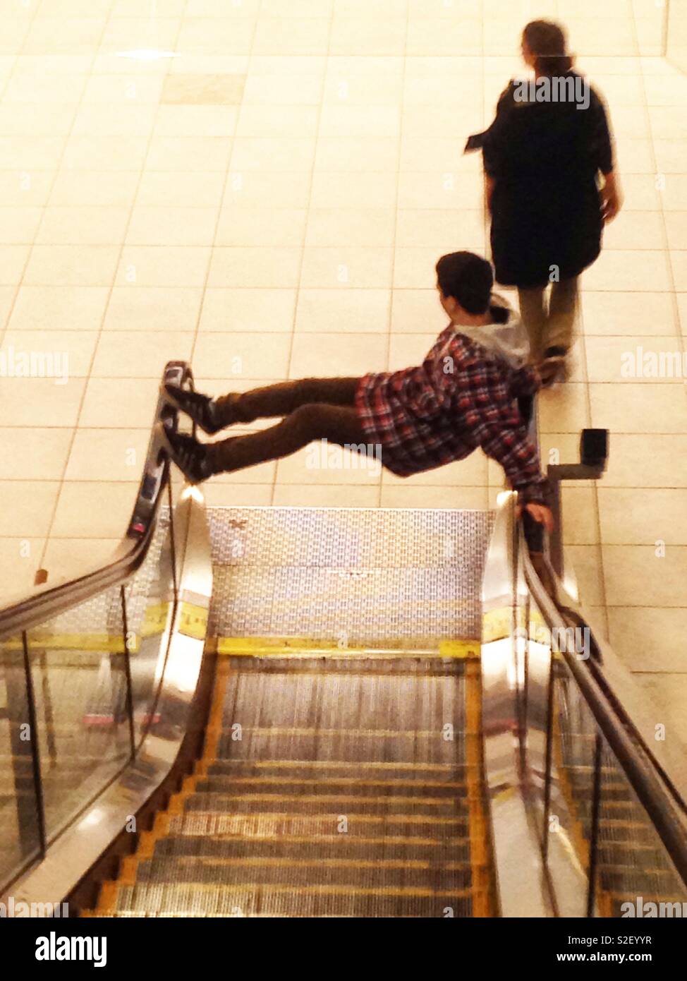 The punk showing off Stock Photo - Alamy