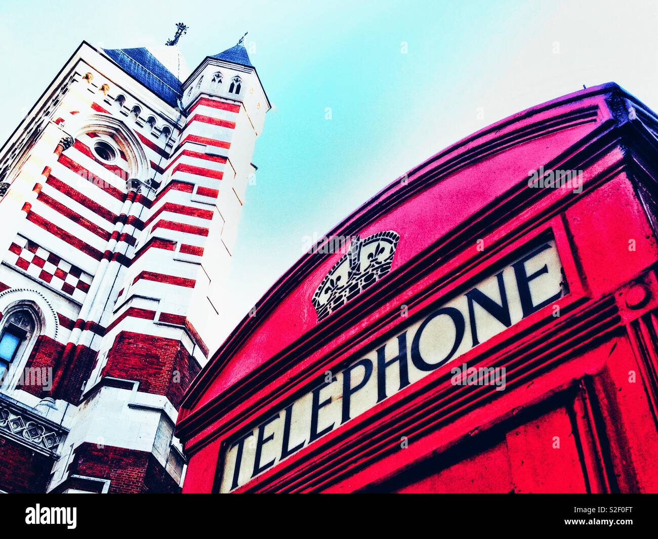 Iconic red telephone box in the shadow of the Royal Courts of Justice ...