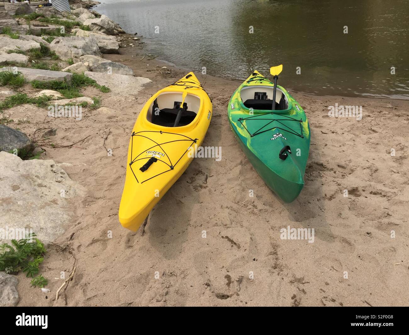 Kayaks On Beach Stock Photo - Alamy