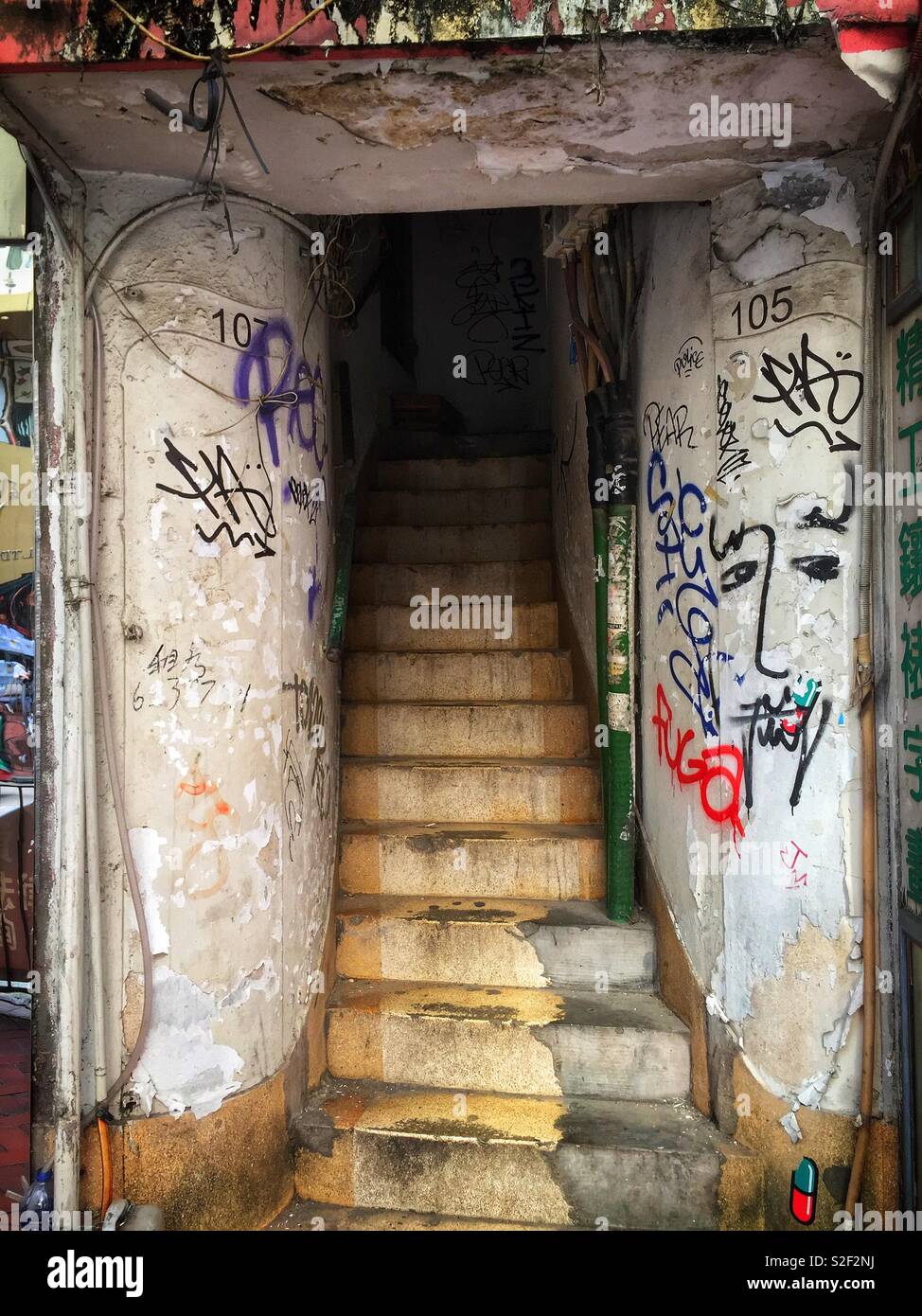 Entrance to an older style walk-up building in Wan Chai, Hong Kong ...